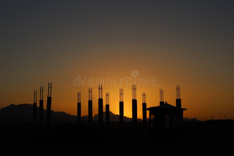 Unfinished Building Constructions on a Sunset Background Stock Photo ...