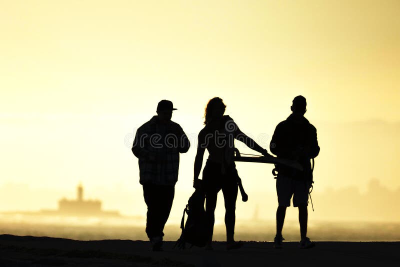 Black Silhouettes of Youth Standing at Sunset Stock Image - Image of ...