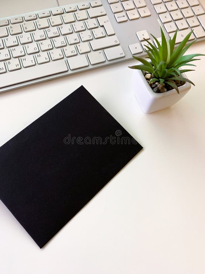 Black Single Envelope on a Natural White Table. Top View, Copy Space ...