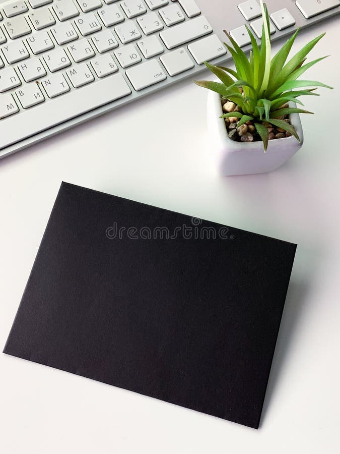 Black Single Envelope on a Natural White Table. Top View, Copy Space ...