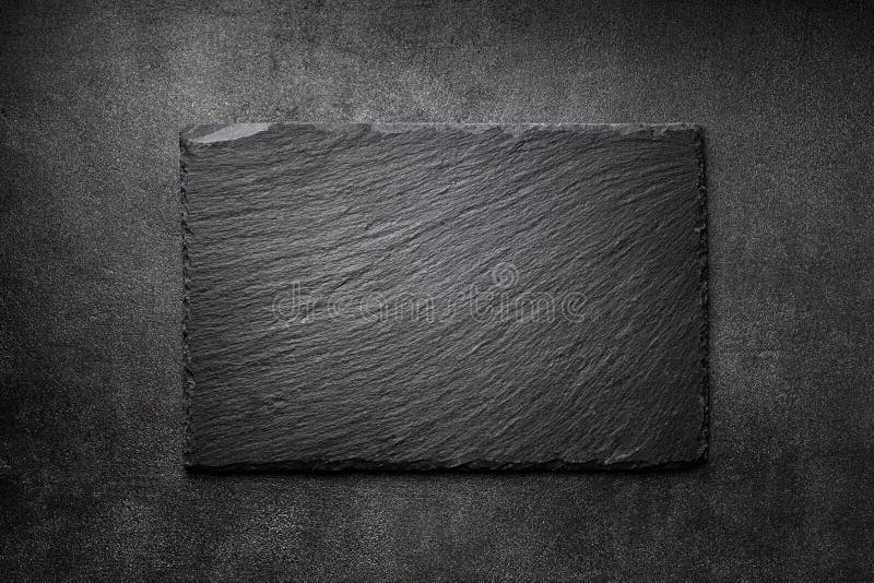 Black Slate Board on Dark Stone Texture Top View. Empty Space for Menu ...
