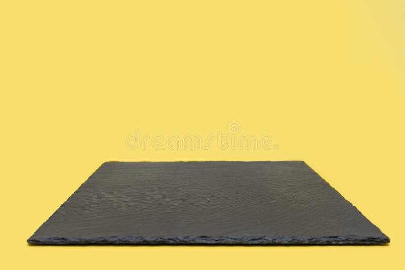 Black Slate Board on a Yellow Background Stock Photo - Image of stone ...