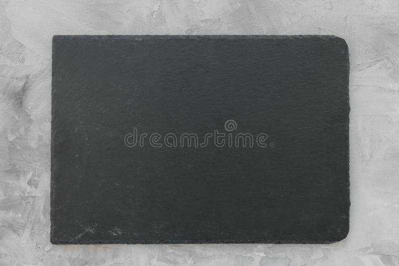 Black Slate Plate Board on Gray Background Stock Photo - Image of plate ...