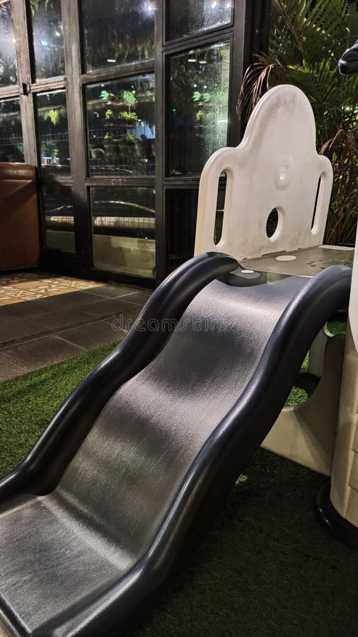 Black Slide Taken in Portrait Mode at Night Stock Photo - Image of ...