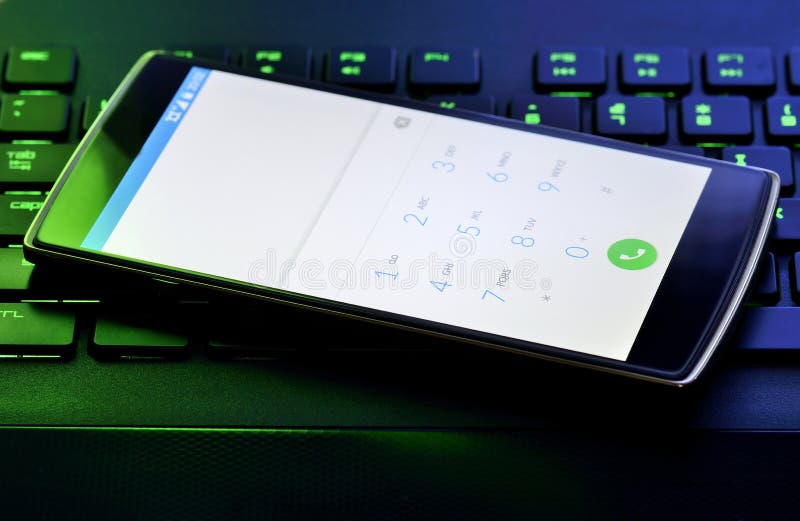 Black Smart Phone on Keyboard Stock Photo - Image of dial, digital ...