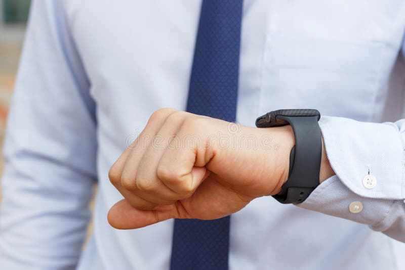 The Black Smart Watch on a Man Hand Close-up. Stock Photo - Image of ...