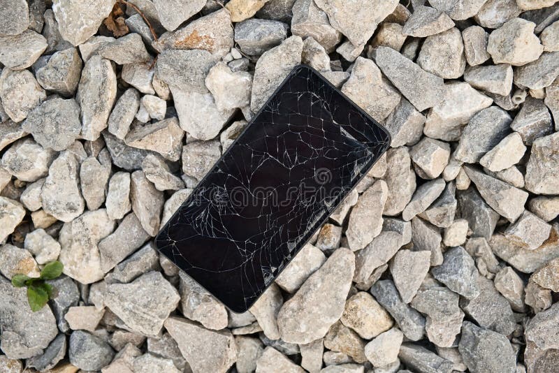 Black Smartphone with Broken Display on the Stones. Stock Image - Image ...