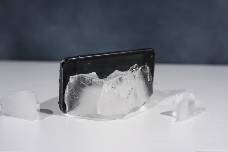 Black Smartphone Frozen in Ice. Abstract Object Photo Stock Photo ...