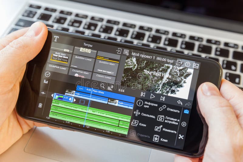 Black Smartphone in Hand. on-screen Video Editing Program. Stock Image ...