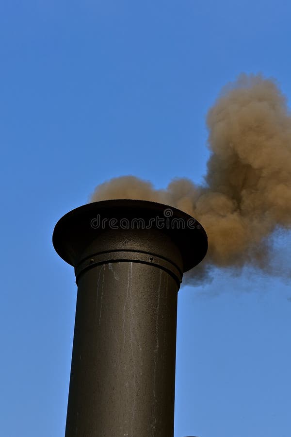 Smoke Billows from the House`s Chimneys. Furnace Heating of the House ...