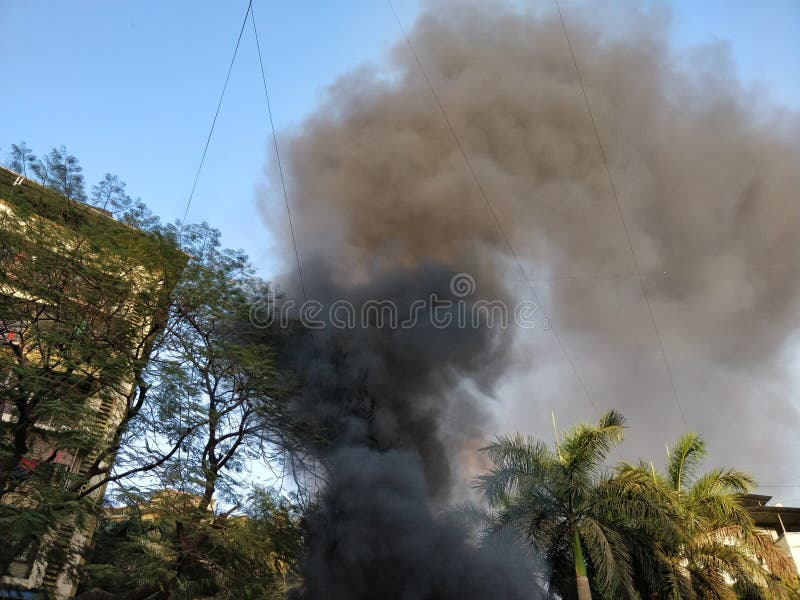 Black Smoke Coming Out of a Building on Fire Stock Image - Image of ...