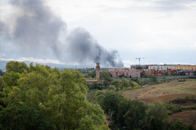 Smoke from a Fire Over a Night City on a Sunset Sky in Rome, Italy ...