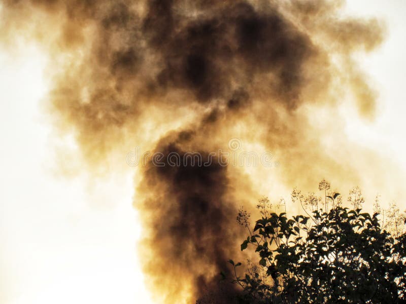 Black Smoke Rising into the Sky. the Air Pollution Caused by Burning ...