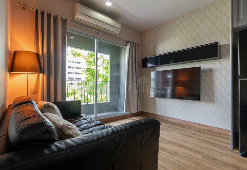 Black Sofa and Tv in Living Room Interior Stock Photo - Image of floor ...