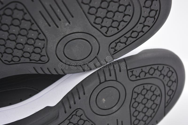 Black Sole from Shoes with White Inserts Made of Dense Rubber with Its ...