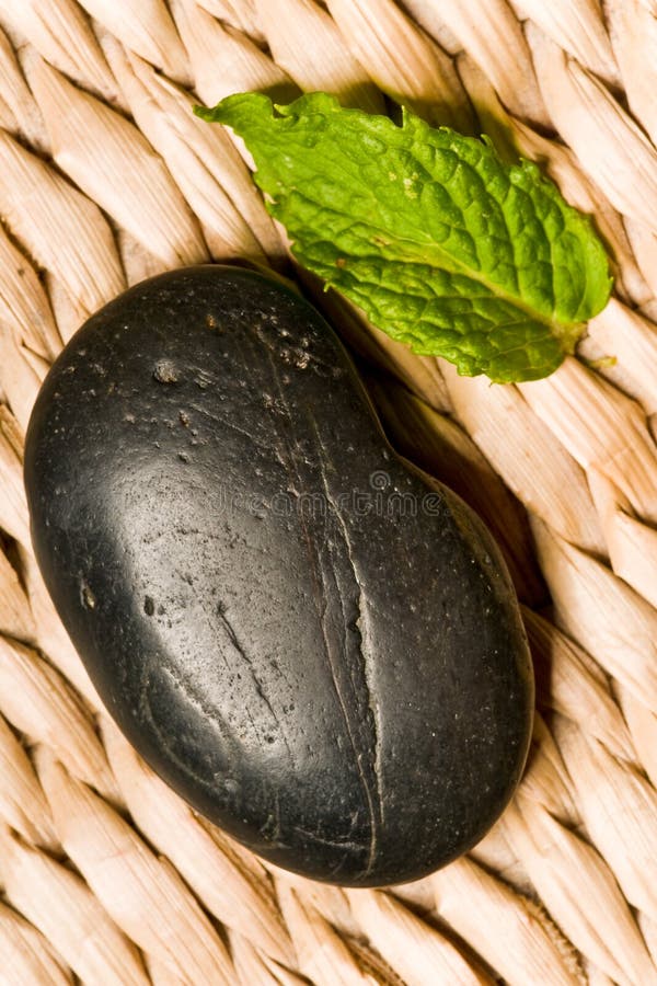 Massage stone with bamboo stock photo. Image of alternative - 5717196