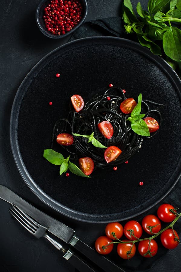 Black Spaghetti with Cuttlefish Ink. Black Background, Top View, Space ...