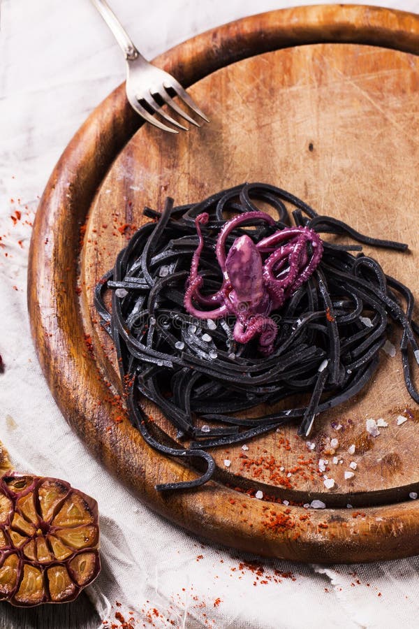 Black Spaghetti with Octopus Stock Photo - Image of cutting, exotic ...