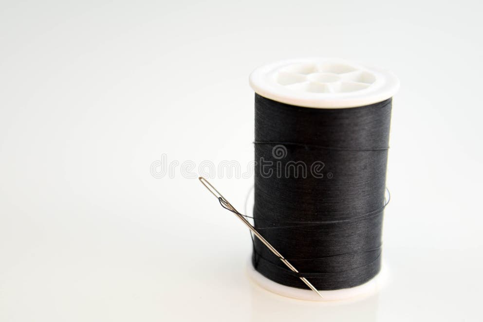 Black Spool of Thread and Needle Stock Image - Image of thread ...
