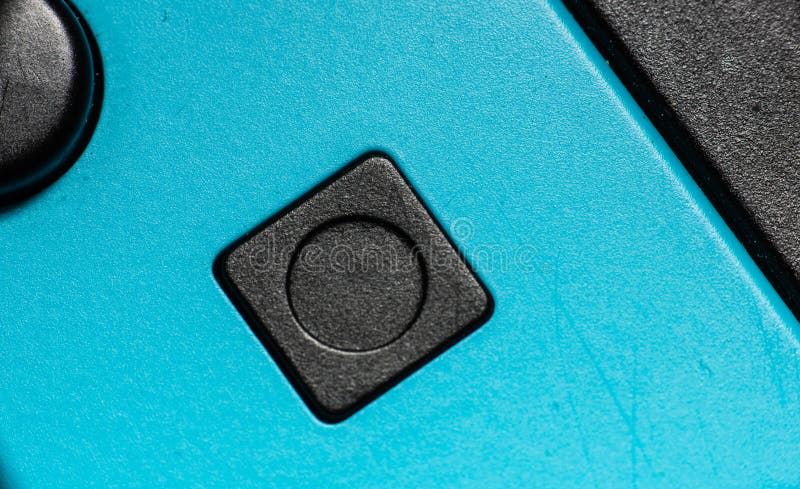 A Black Square Button on a Blue Hand Controller.. Stock Photo - Image ...