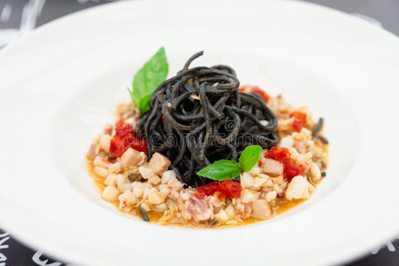 Black Squid Ink Pasta with Seafood Stock Photo - Image of pasta ...