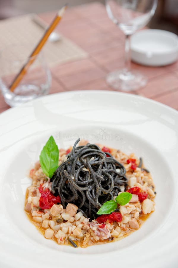 Black Squid Ink Pasta with Seafood Stock Photo - Image of arrangement ...