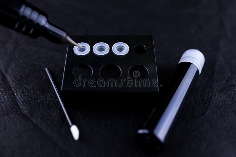 On a Black Stand is a Container for Permanent Eyebrow Makeup Pigment ...