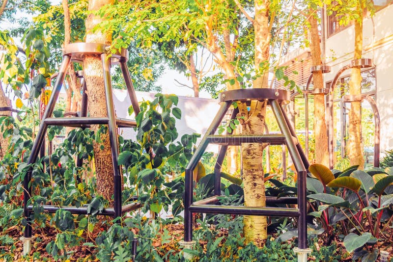 Black Steel Column Supports and Controls the Branches and Trunks of the ...