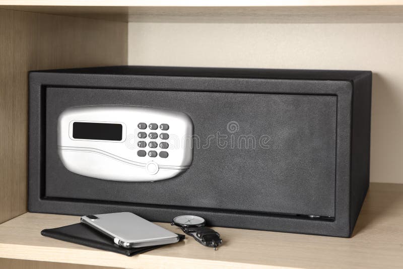 Black Steel Safe with Electronic Lock in Wooden Closet Stock Image ...
