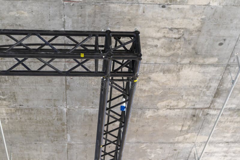 A Black Steel Structure is Installed in the Concrete Ceiling To Support ...