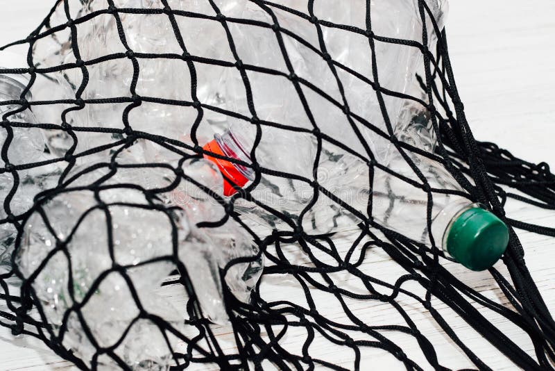 Black String Bag with Plastic Bottles, Ecology Concept. Stock Image ...