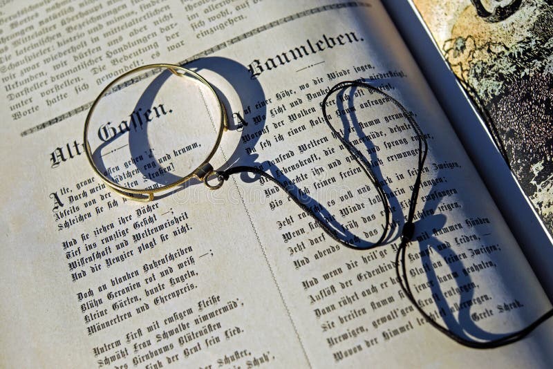 Black String On Top Of An Open Book During Daytime Stock Image - Image ...