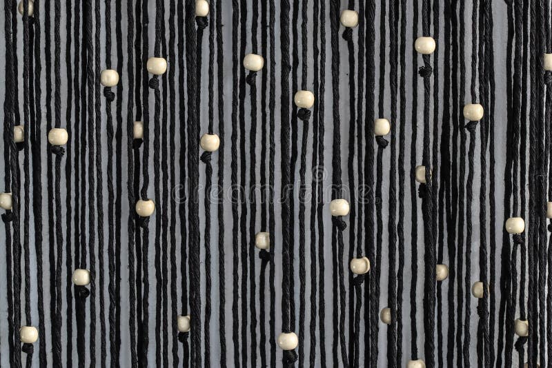 Black strings with beads stock image. Image of creativity - 211460961