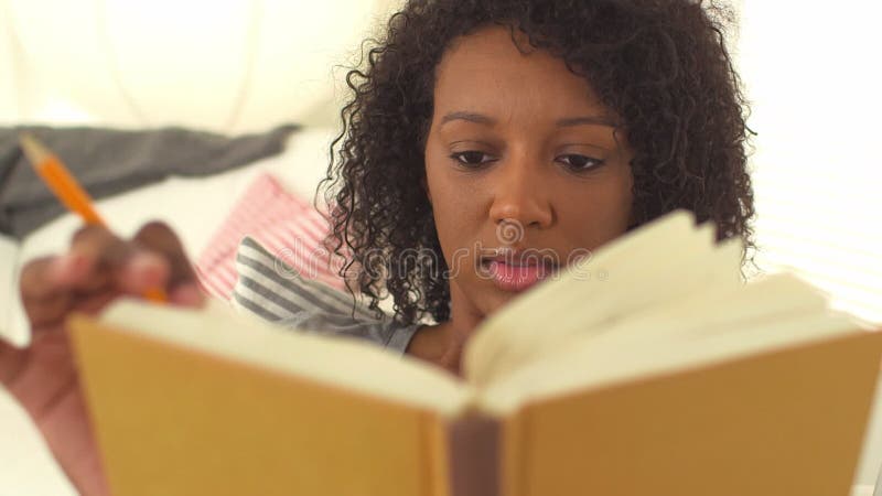Black Student Researching Biotechnology in an University Library Stock ...