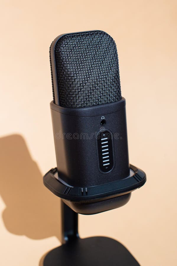 Black Studio Microphone with Isolation Shield on Beige Background Stock ...