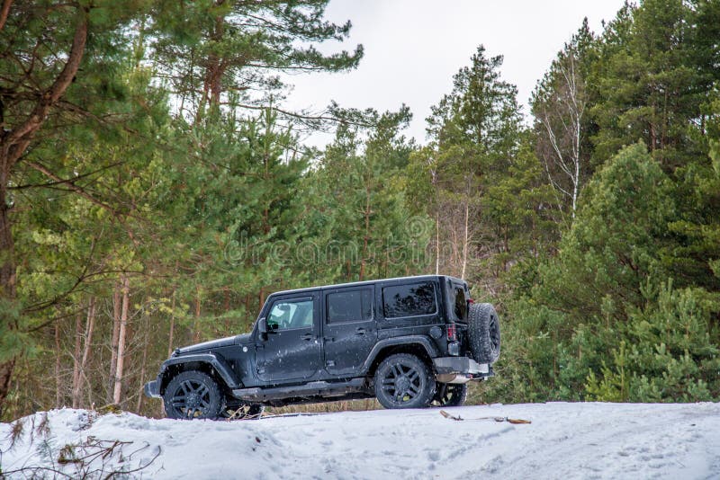 Black Sub Car in Winter Forest Stock Photo - Image of powerful, black ...