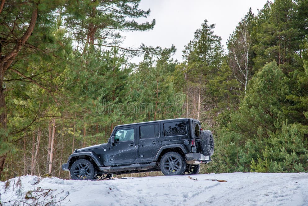 Black Sub Car in Winter Forest Stock Photo - Image of powerful, black ...
