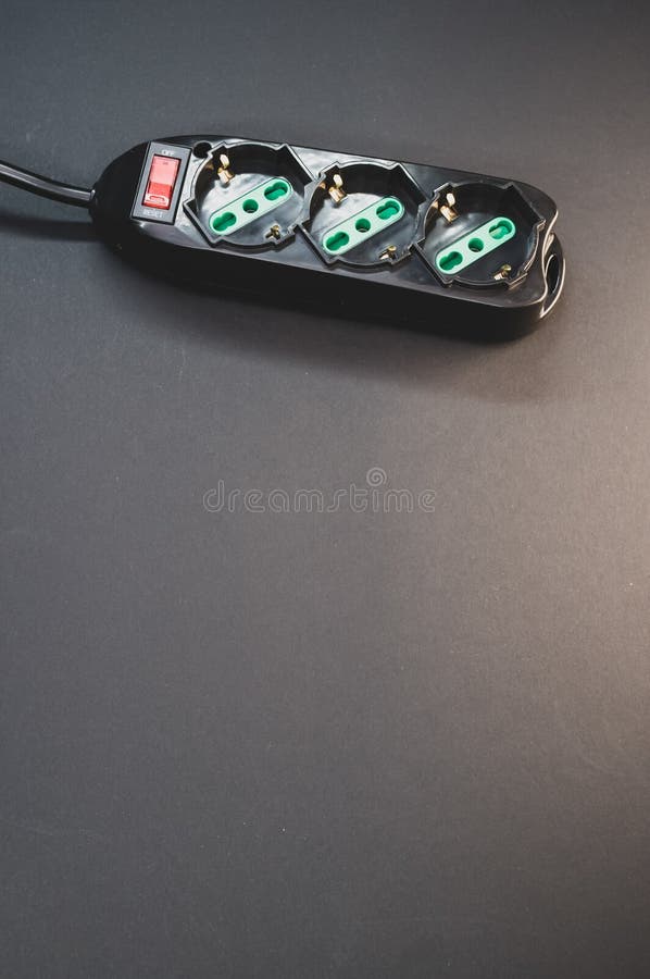 Black Surge Protector on a Black Background Stock Image - Image of ...