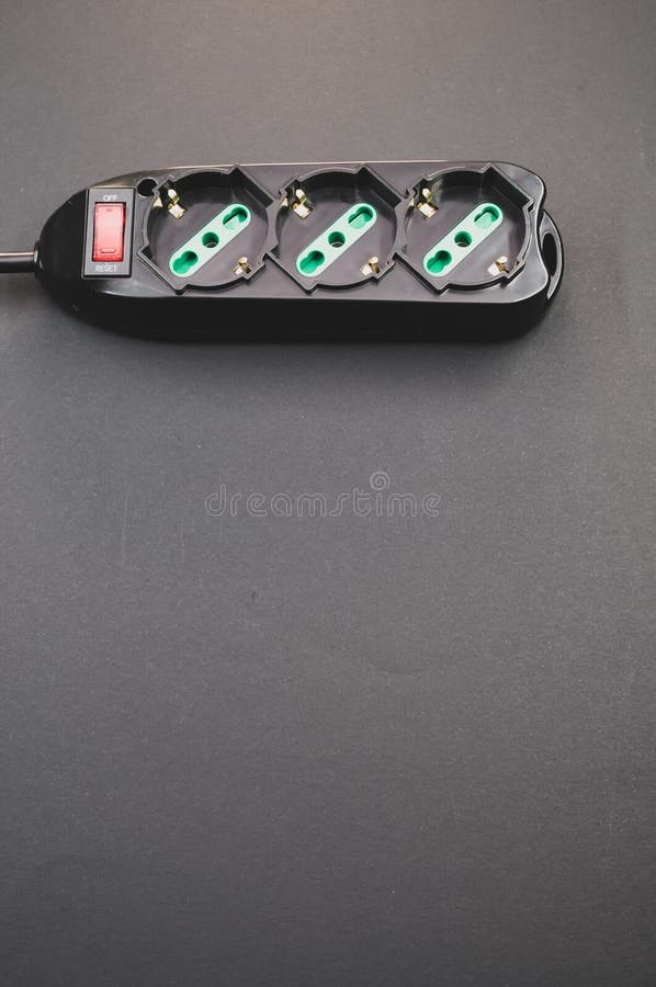 Black Surge Protector on a Black Background Stock Image - Image of ...