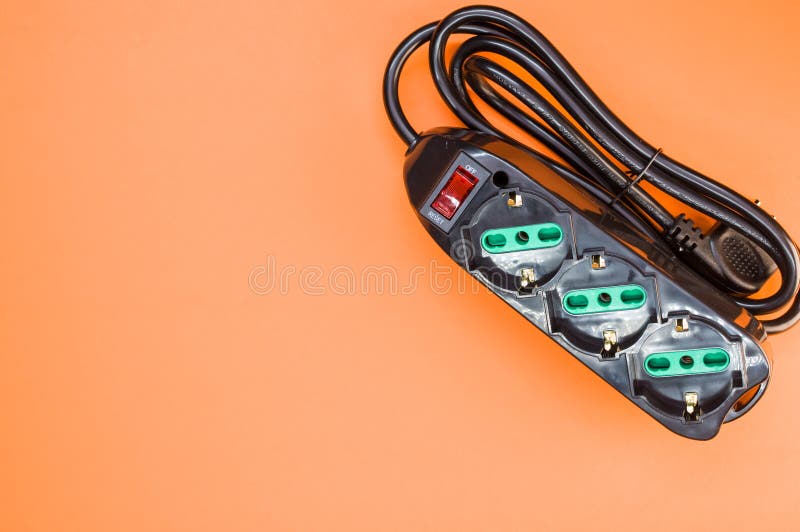 Black Surge Protector on an Orange Background Stock Image - Image of ...