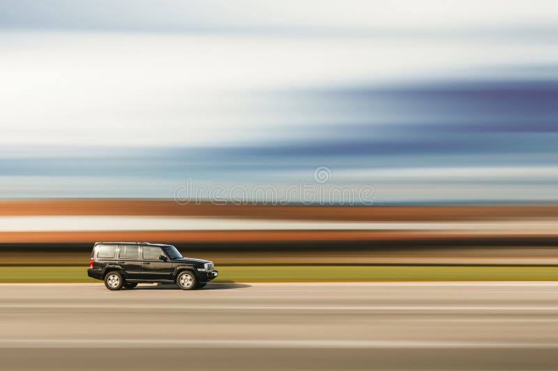 Black SUV. a Fast Moving Black Car with a Speed Blur Background Stock ...