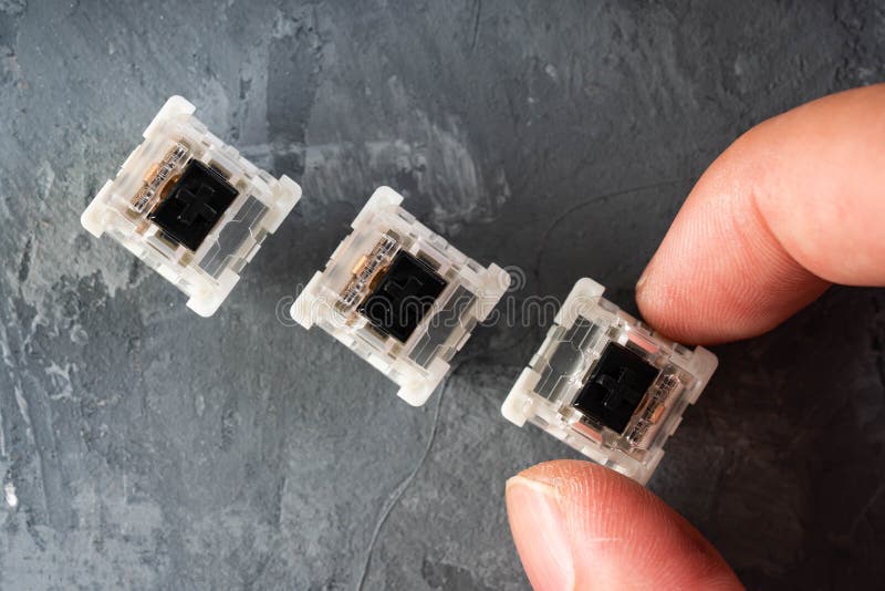 A Black Switch Mechanical Keyboard on the Palm of a Hand Stock Photo ...