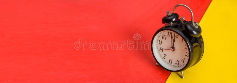 Black Table Clock on Yellow and Red Banner Template Stock Photo - Image ...