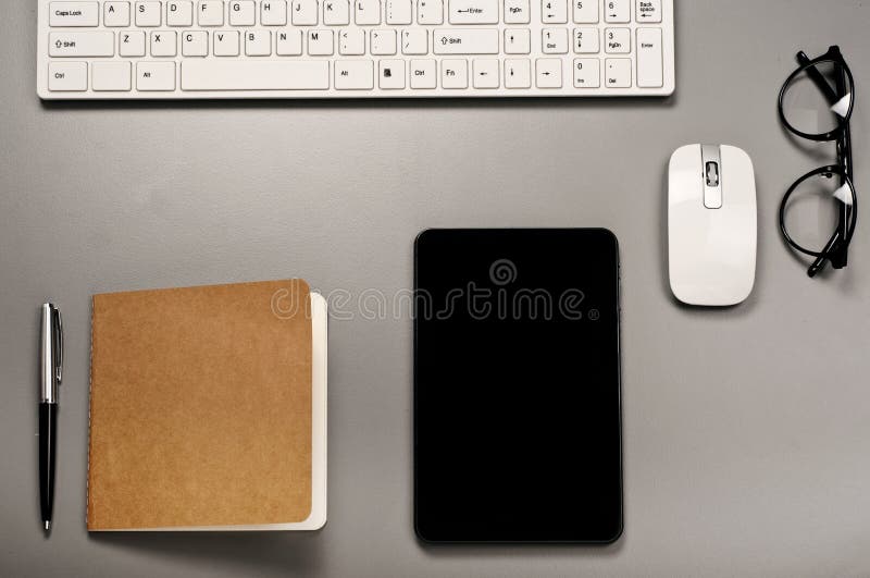 Black Tablet Computer with a Keyboard, Mouse, Pen and Notepad Stock ...