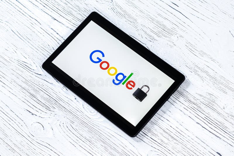 Black Tablet Computer on a White Wooden Table with a Messenger Google ...