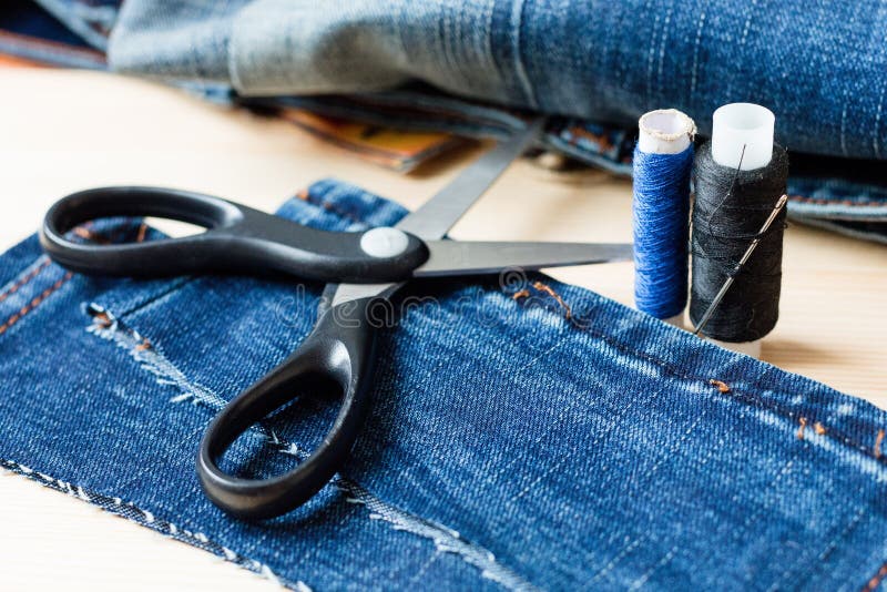 Black Tailor Scissors, Two Balls of Thread and Blue Jeans Stock Image ...