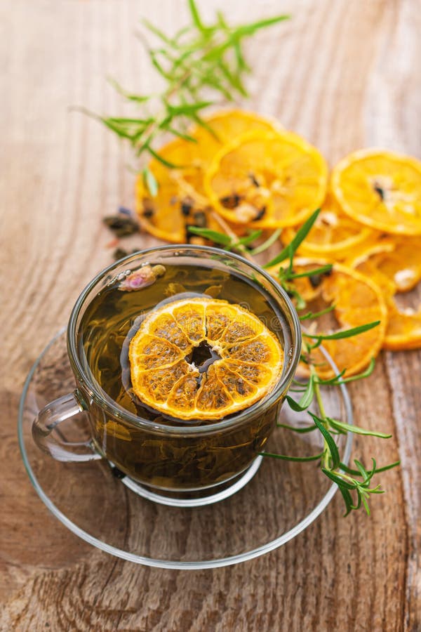 Black Tea. Cup of Tea with Dried Orange and Rosemary Stock Photo ...