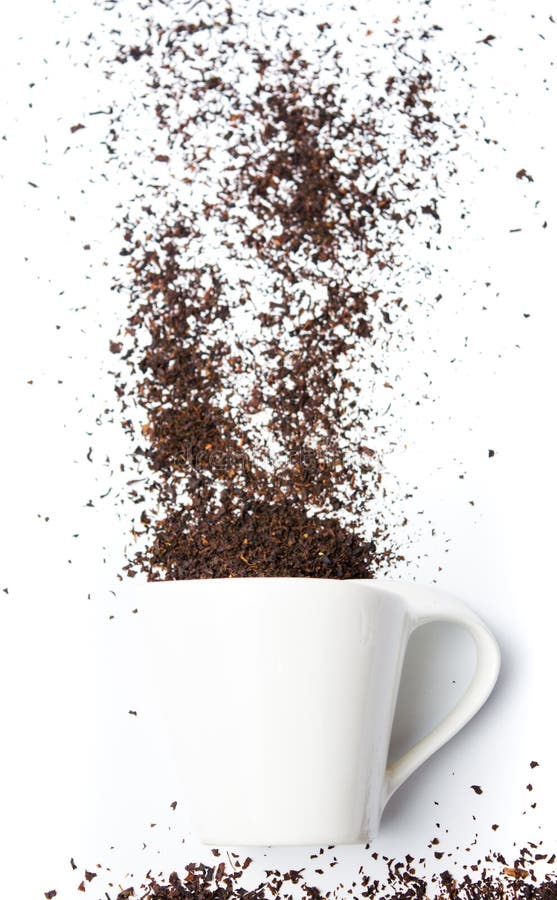Black Tea Grains Falling From A Teacup Stock Photo - Image of ...