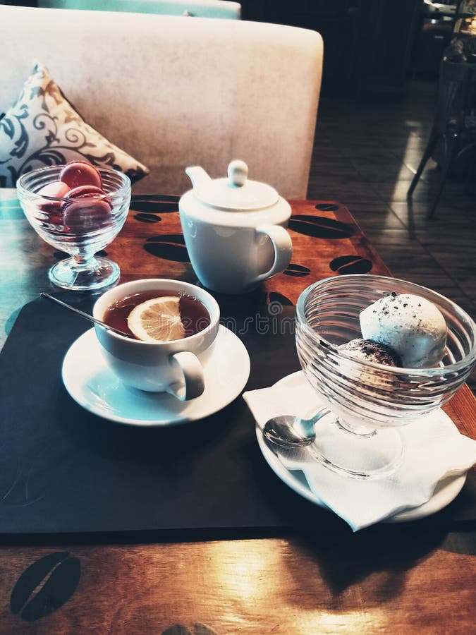 Black Tea with Lemon and Dessert in the Cafe Stock Image - Image of ...
