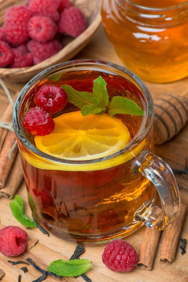 Black Tea with Lemon, Mint, Raspberry and Cinnamon Stock Image - Image ...